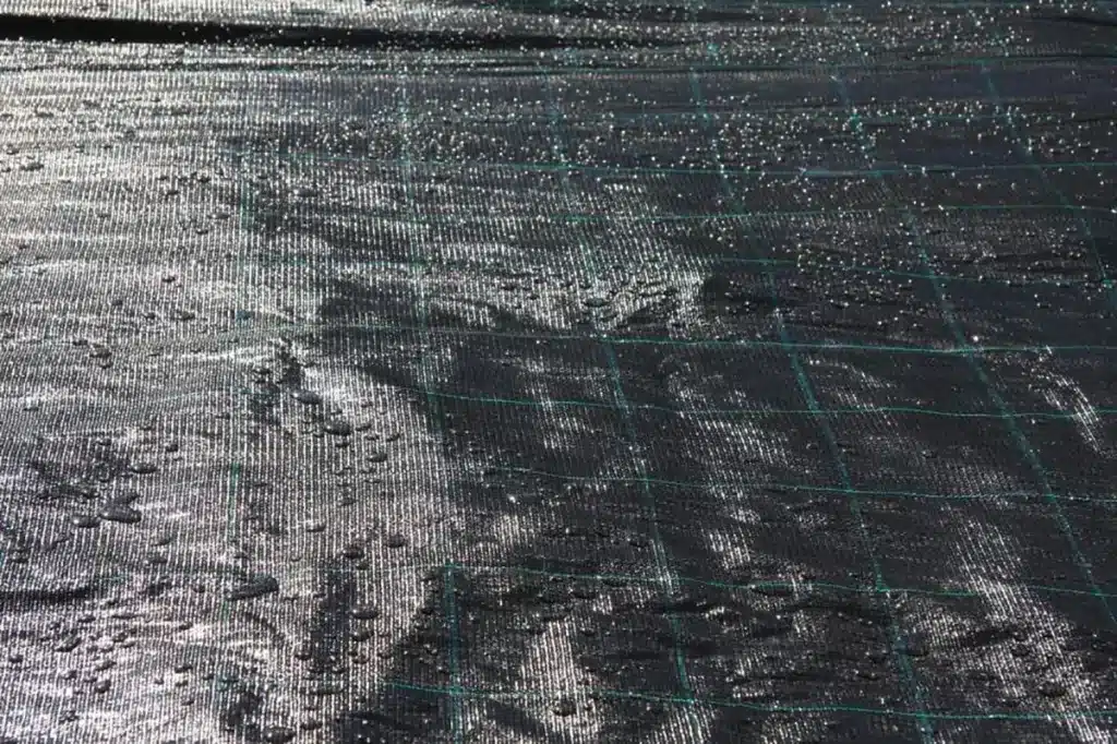 Using Landscape Fabric Under Gravel: Benefits and Tips